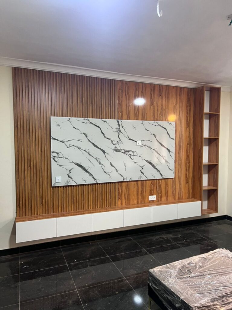 Buy Modern TV Wall Panel with Marble Finish, LED Lighting & Storage